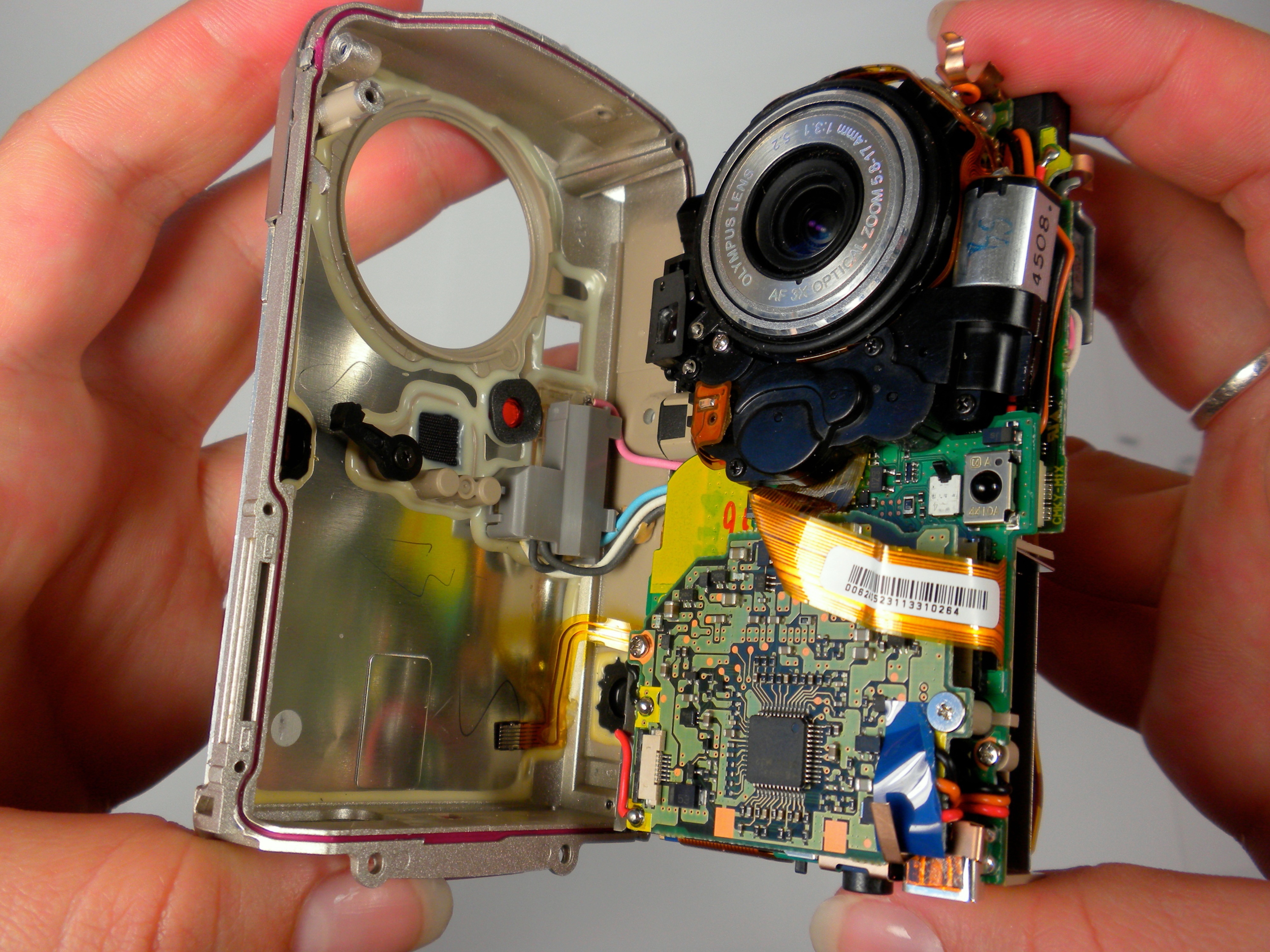 Olympus Stylus 410 Logic Board Replacement - iFixit Repair Guide