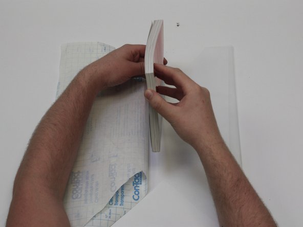 How to Repair A Damaged Book Cover - iFixit Repair Guide