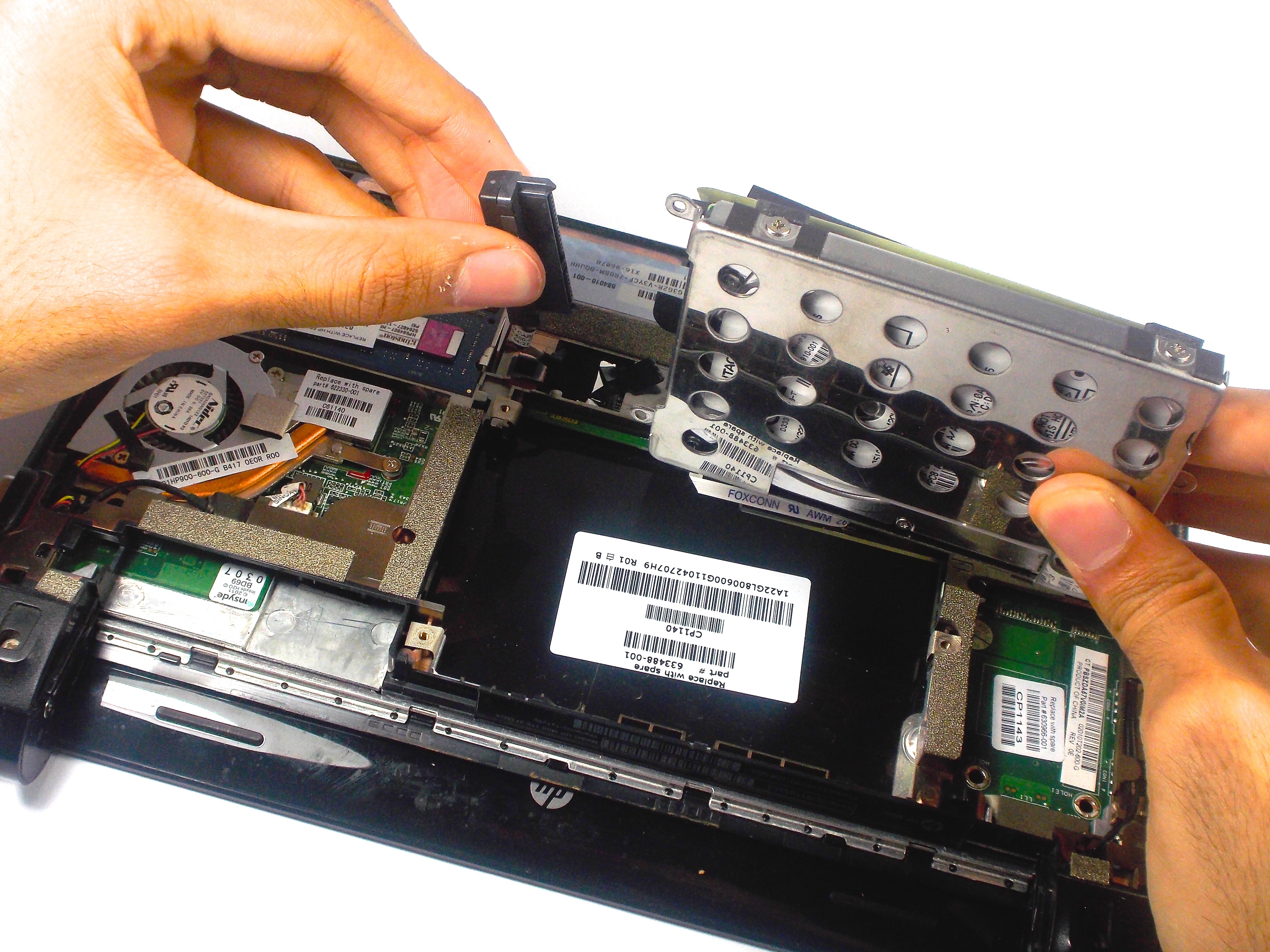 HP Mini 110-3735dx Hard Drive Cage Replacement - iFixit
