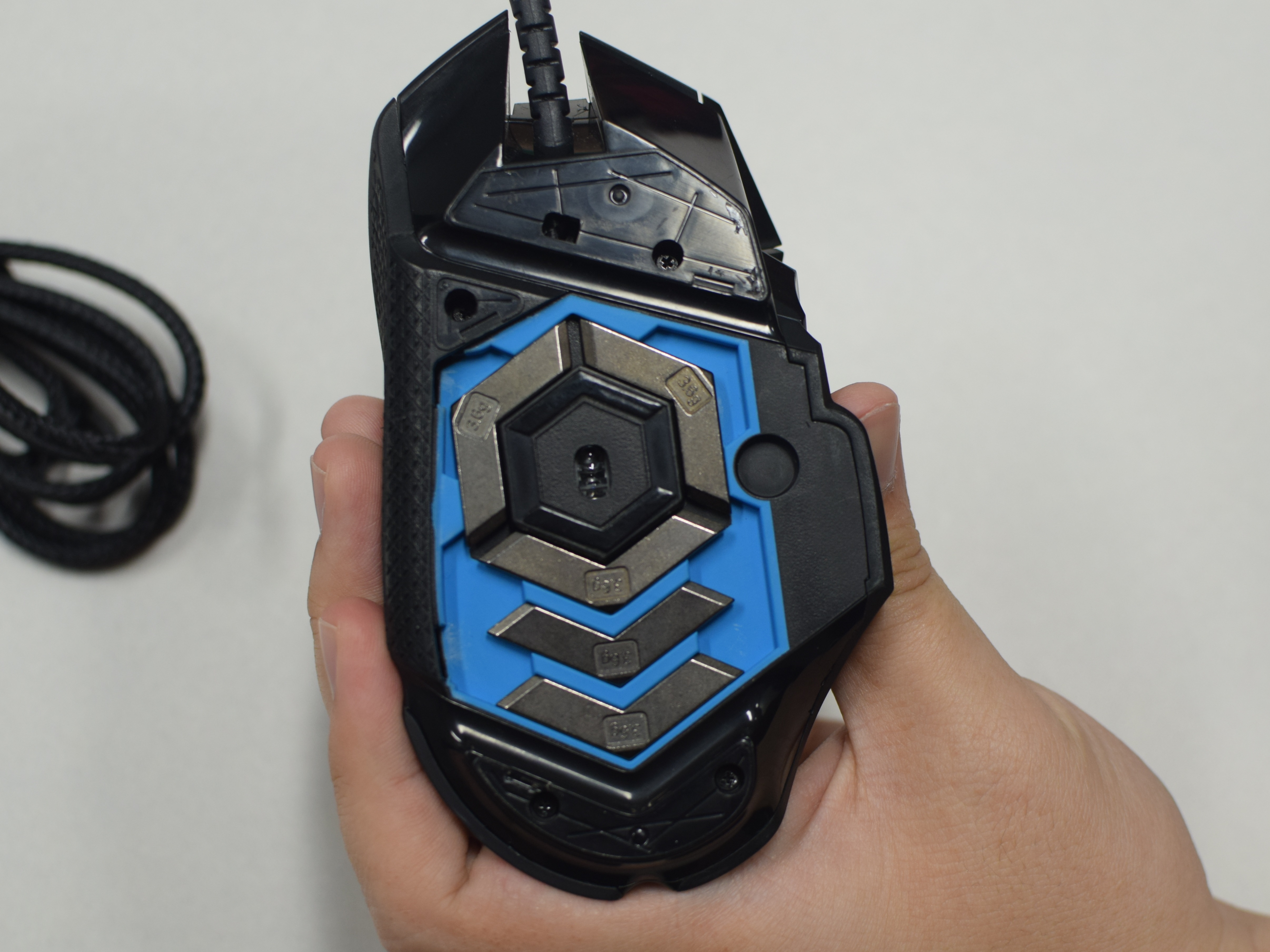Logitech G502 Proteus Core Weight Replacement - iFixit Repair Guide