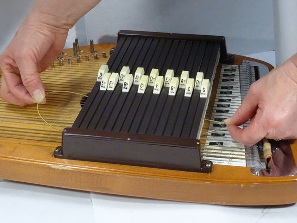 Replacing an autoharp string (Type B) - iFixit
