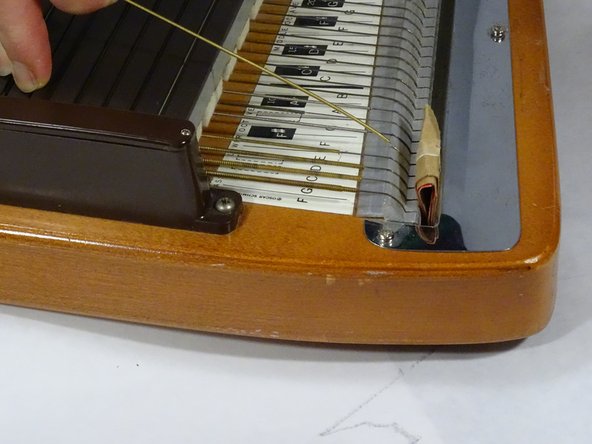 Replacing an autoharp string (Type B) - iFixit