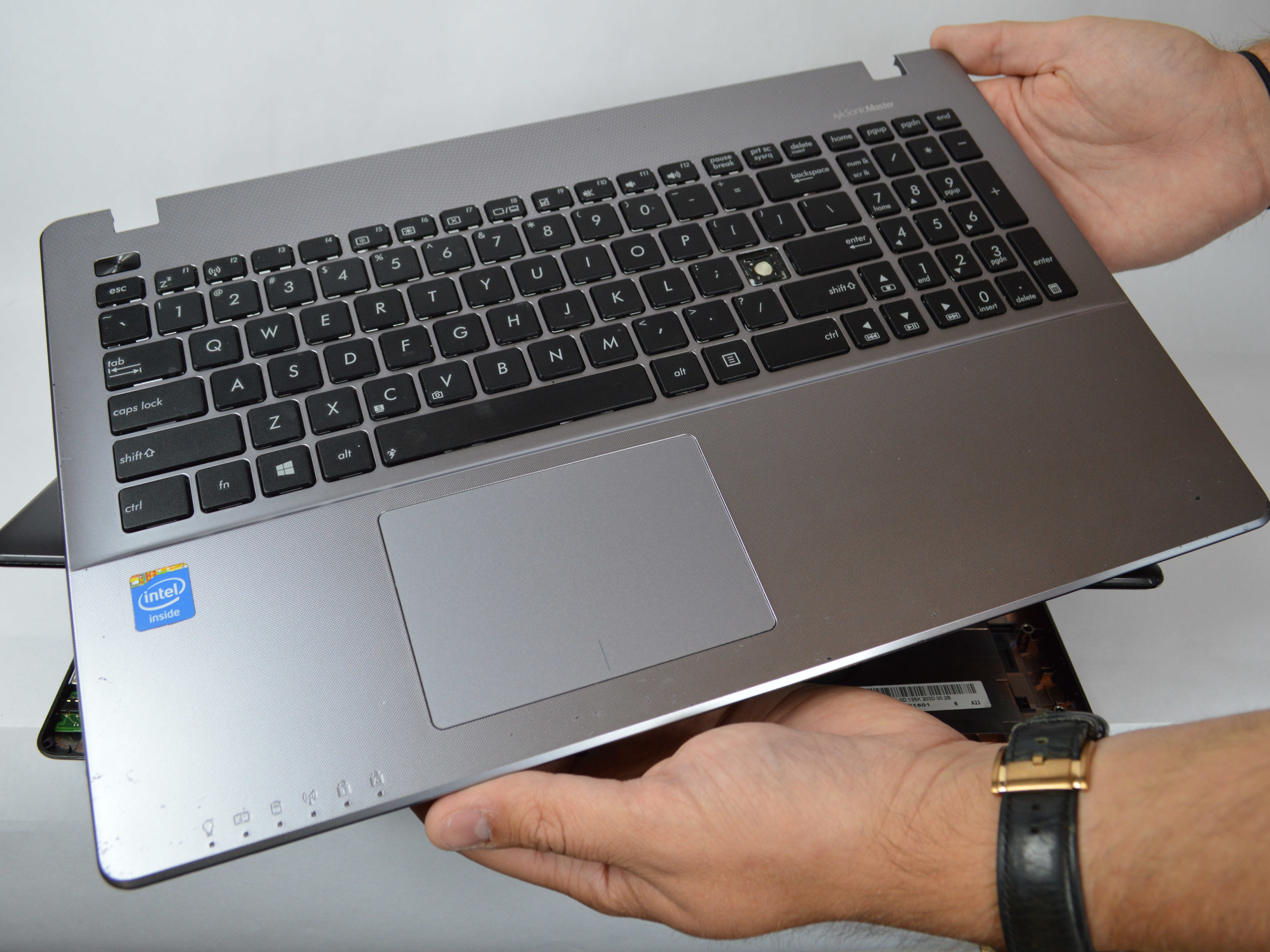 Asus R510CA-OB01 Keyboard and Mousepad Replacement - iFixit Repair Guide