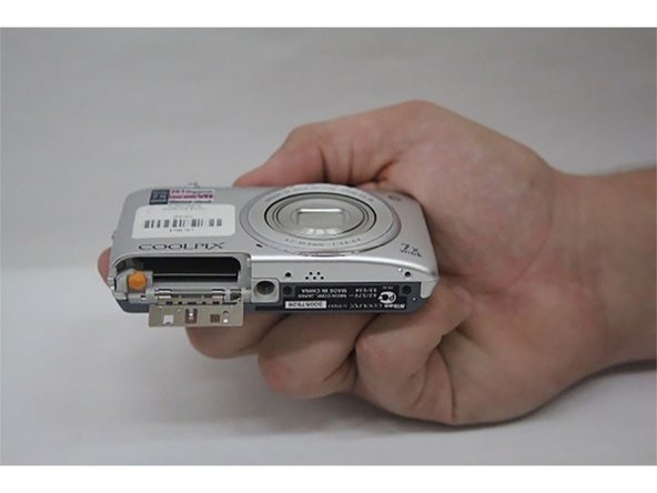 Nikon Coolpix S3500 Battery and memory card door Replacement - iFixit ...
