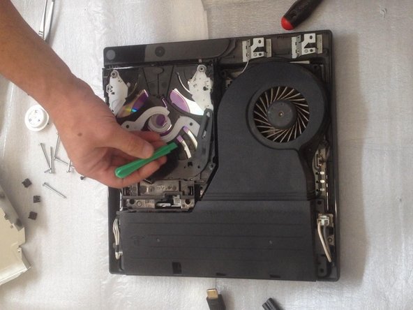 PlayStation 3 Slim - Manually Removing Stuck Disk - iFixit Repair Guide