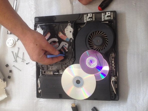 PlayStation 3 Slim - Manually Removing Stuck Disk - iFixit Repair Guide