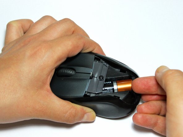 Logitech V220 - Cordless Optical Mouse Battery Replacement - iFixit ...