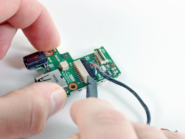 HP Mini 1000 USB & Power Board Replacement - iFixit Repair Guide