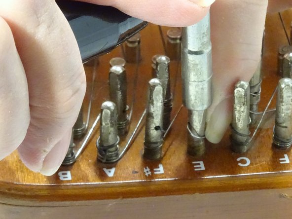 Replacing an autoharp string (Type B) - iFixit