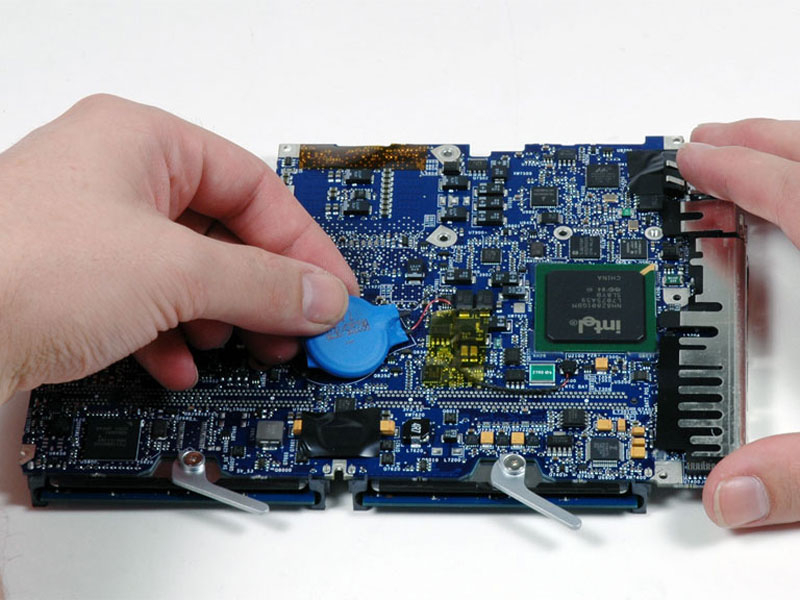 MacBook Core 2 Duo PRAM Battery Replacement - iFixit Repair Guide