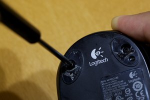 So how do I fix the stiff left button issue? - Logitech v470 - iFixit