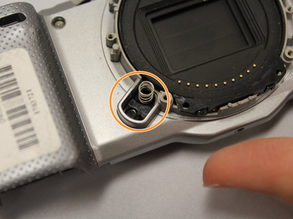 Sony Alpha NEX-5N Lens Release Button Replacement - iFixit