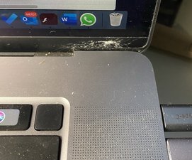 Is it possible to repair MacBook Pro cracked logo bezel? - MacBook Pro ...