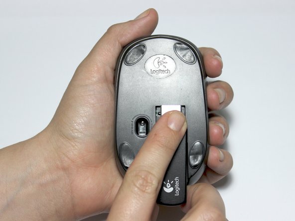 Logitech V220 - Cordless Optical Mouse Battery Replacement - iFixit ...