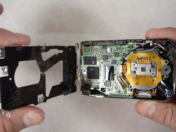 How to access a Nikon Coolpix S210 jammed lens - iFixit