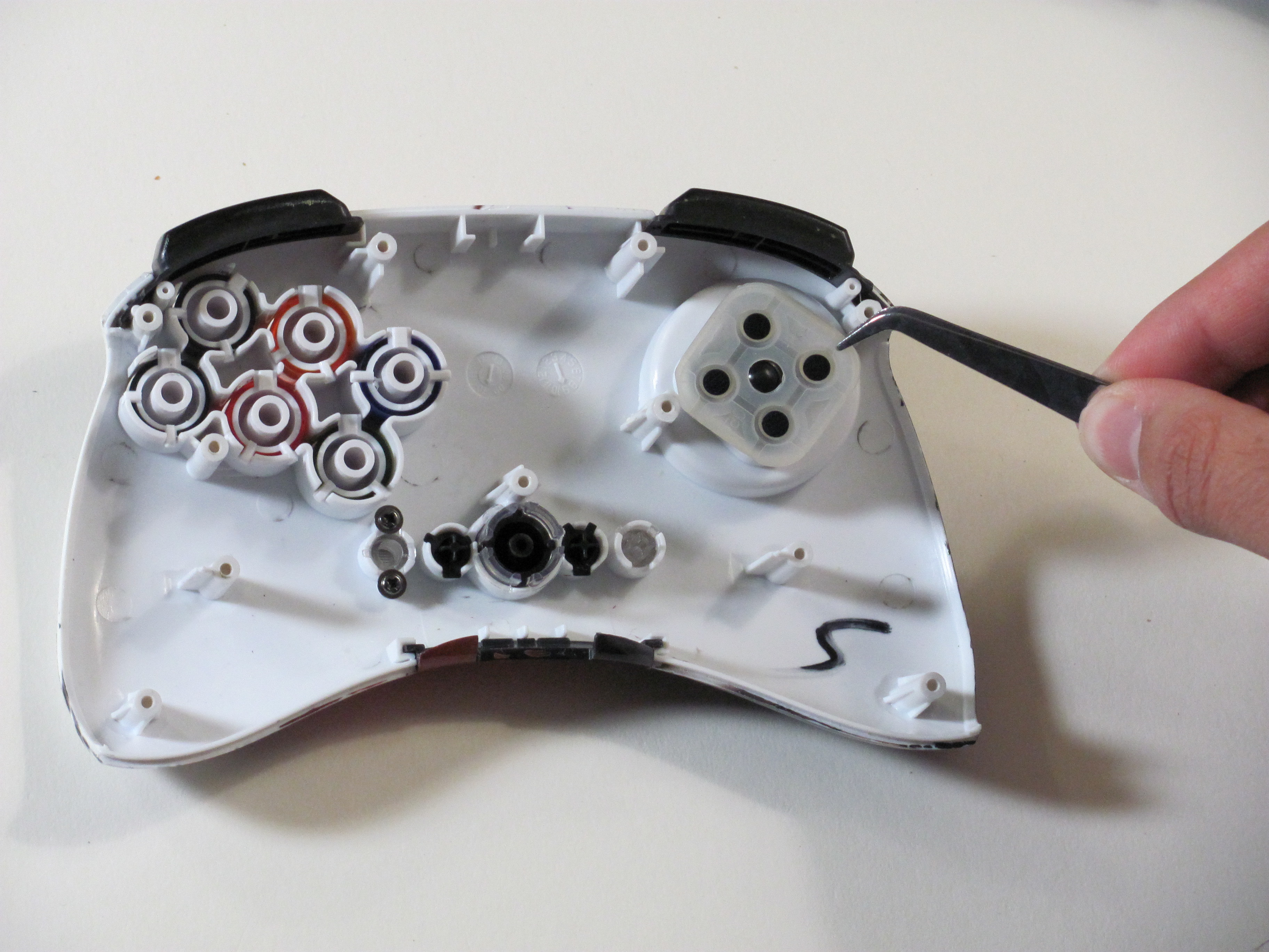 Mad Catz Street Fighter IV FightPad Directional Pad Replacement - iFixit