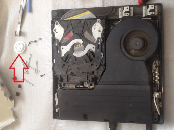 PlayStation 3 Slim - Manually Removing Stuck Disk - iFixit Repair Guide