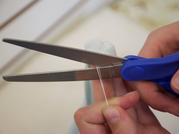 How to shorten shirt straps - iFixit